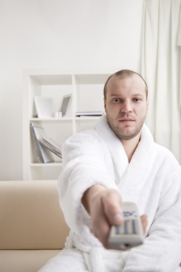Young man watch tv stock photo. Image of casual, enjoyment - 67404542