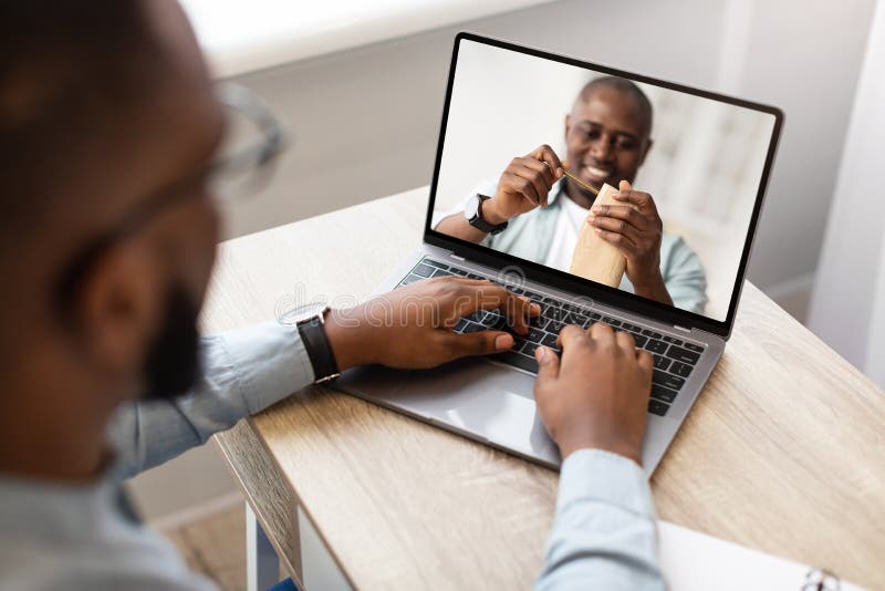 Young Man Watching Online DIY Class, Participating in Woodworking ...