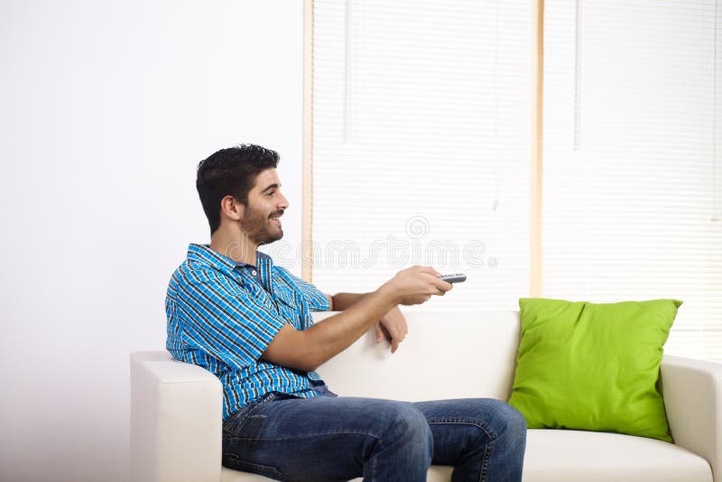 Young Man Watching Television Stock Photo - Image of adults, people ...