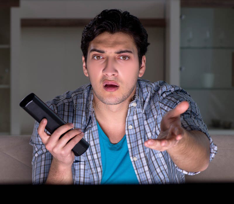 Young Man Watching Tv Late at Night Stock Image - Image of couch ...