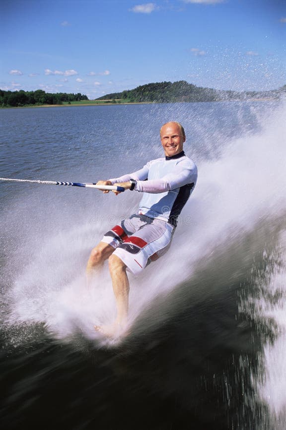 A young man water skiing stock photo. Image of person - 6077084