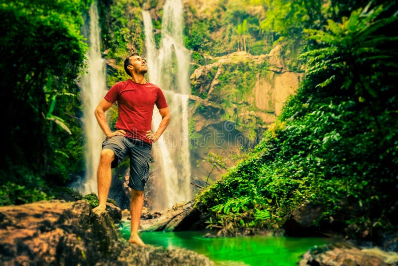 Young Man by the Waterfall stock photo. Image of handsome - 100891268
