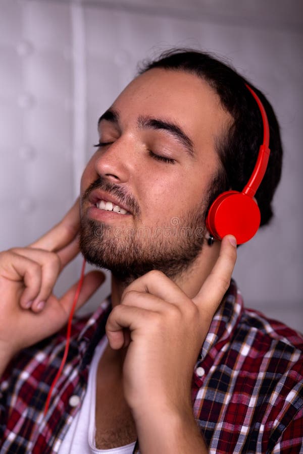 Young Man Wearing Headphones Stock Photo - Image of people, headphones ...