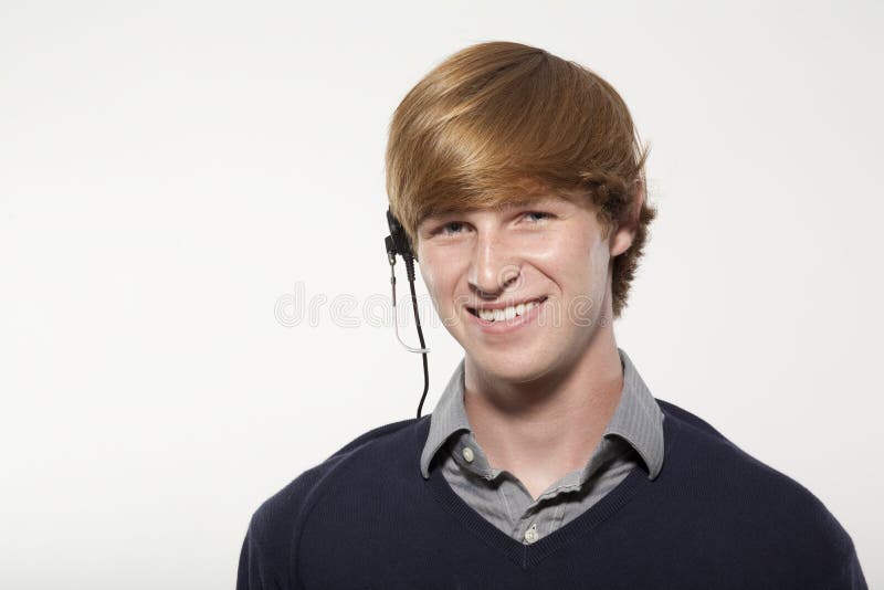 Young Man Wearing a Headset Stock Photo - Image of business, contact ...