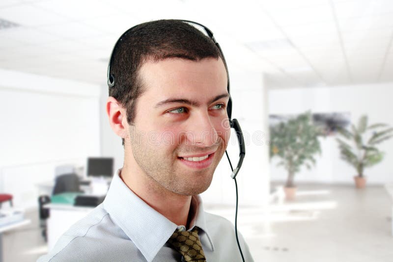 Young man wearing headset stock photo. Image of corporate - 18384176