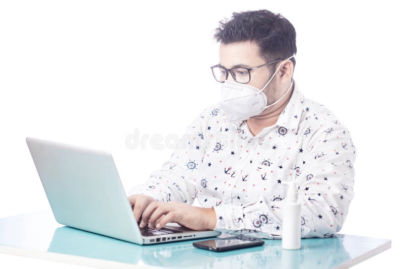 Young Man Wearing Mask Typing on Laptop Keyboard Stock Photo - Image of ...