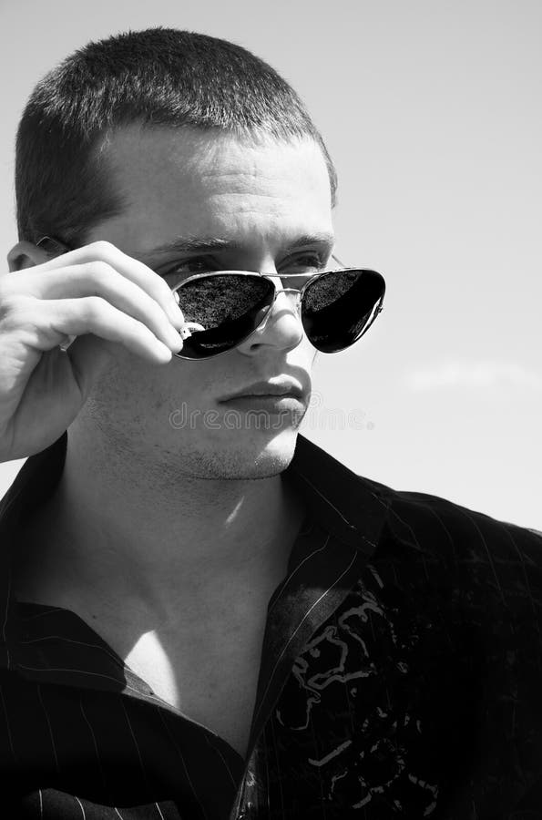 Young man wearing shades stock image. Image of beauty - 13379603