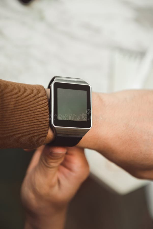 Young Man Wears Smart Watch Working on Table Stock Photo - Image of ...