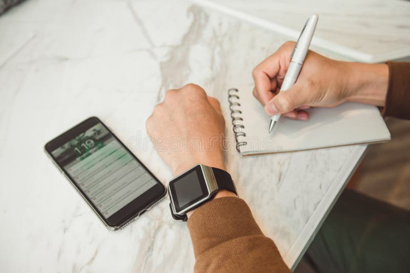 Young Man Wears Smart Watch Working on Table Stock Photo - Image of ...