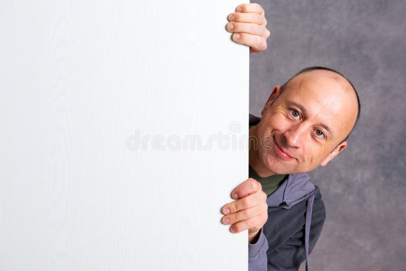 Young Man with a White Advertising Board Stock Photo - Image of ...