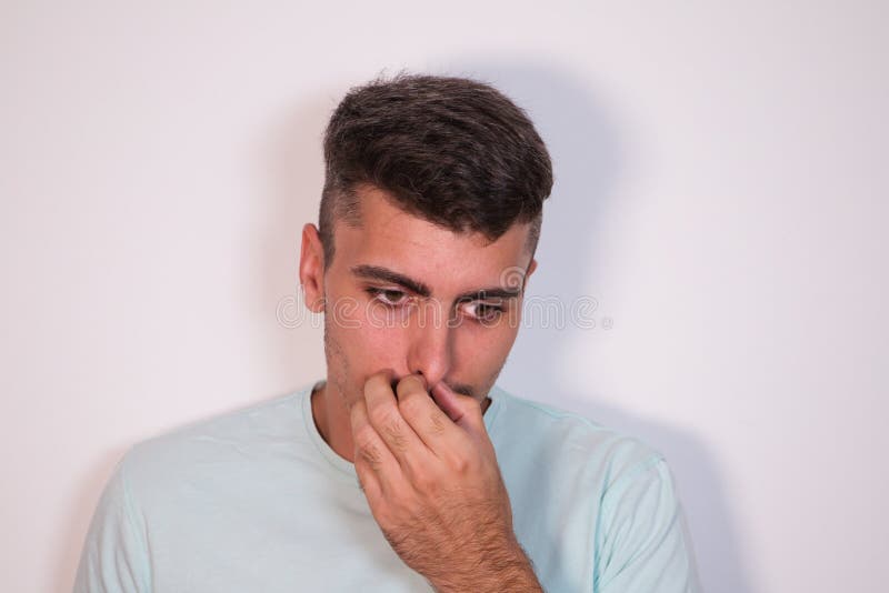Young Man on White Background Looking with Questioning Face. Concept ...