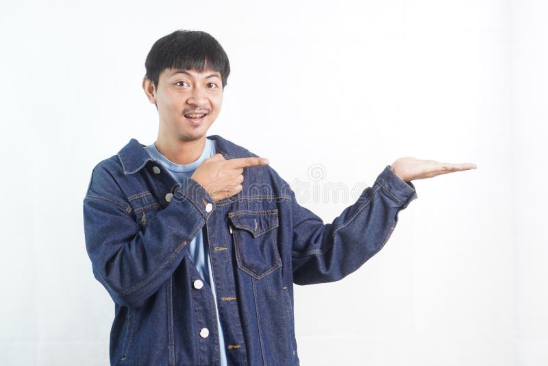 Young Man on the White Background Showing Right Direction with Him ...