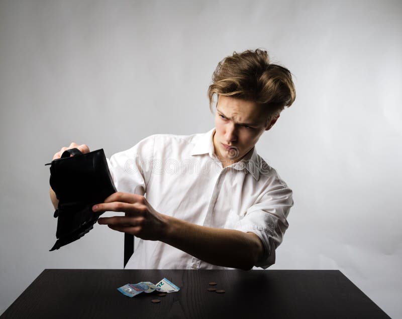 Young Man in White and Empty Wallet Stock Photo - Image of jobless ...