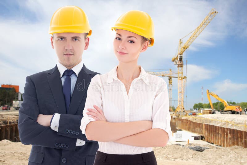 Young Man and Woman in Builder S Helmets Stock Image - Image of hard ...