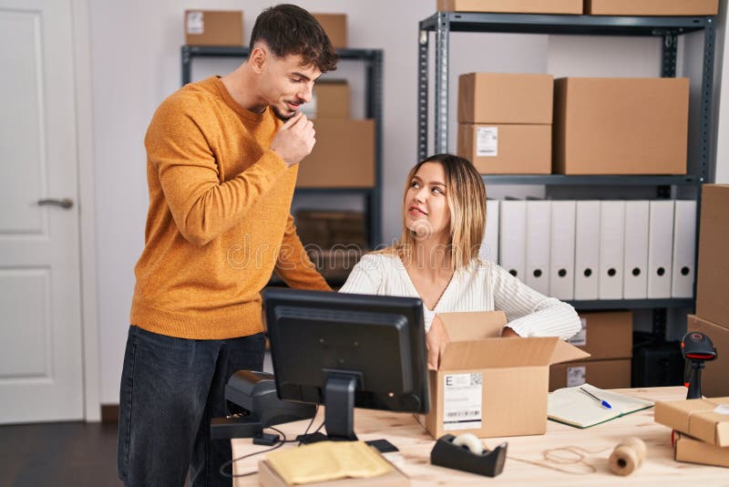 Young Man and Woman Ecommerce Business Workers Packing Order at Office ...