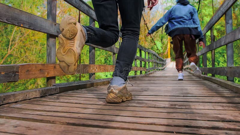 Young Man and Woman Running on the Bridge Stock Image - Image of nature ...