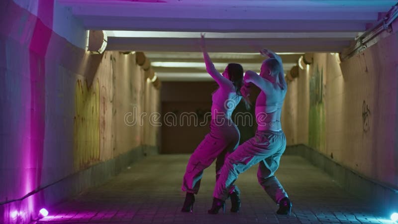 Young Man and Woman Showcase Freestyle Dance on High Heels Stock ... Young Man and Woman Showcase Freestyle Dance on High Heels Stock ...