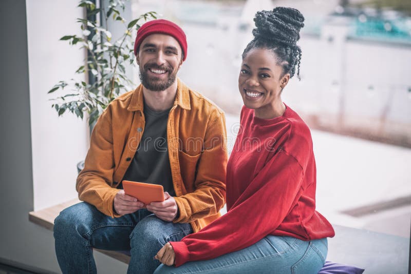 Young Man and a Woman Talking and Looking Interested Stock Image ...