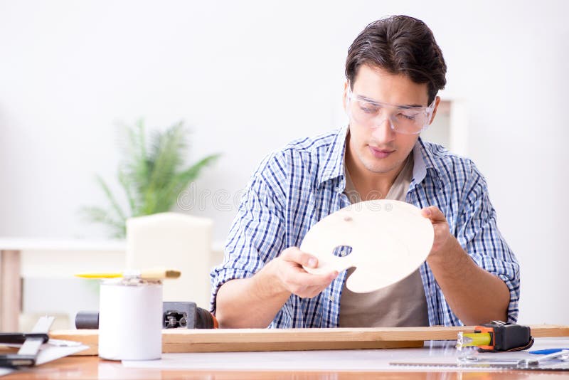 The Young Man in Woodworking Hobby Concept Stock Photo - Image of ...
