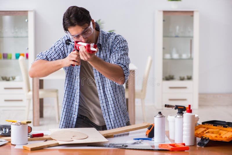 The Young Man in Woodworking Hobby Concept Stock Image - Image of ...