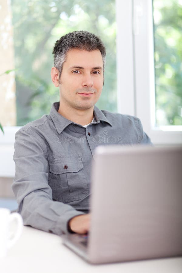 Young man at work stock photo. Image of design, cheerful - 71908080