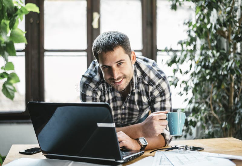 Young Man Work Remote in His Cool Home Office. Modern Workspace Studio ...
