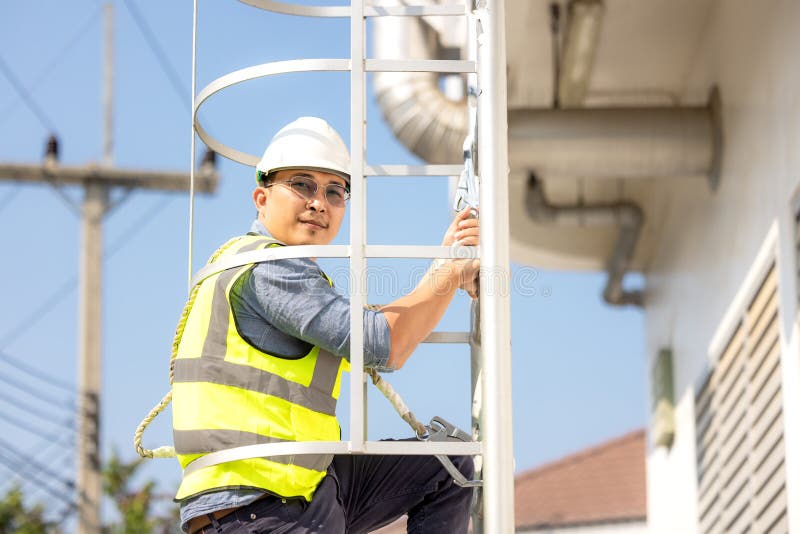 Young Man Worker or Engineer Climb Ladder Stock Image - Image of climb ...