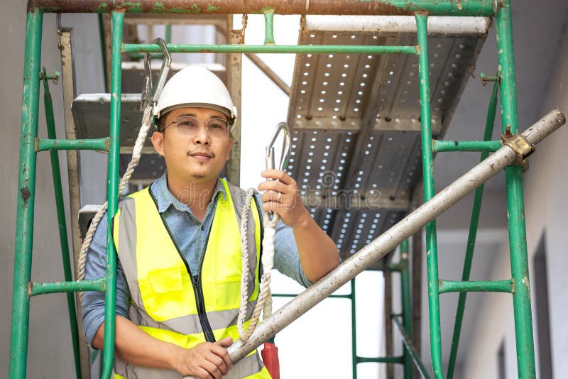Young Man Worker or Engineer Climb Ladder Stock Image - Image of ...