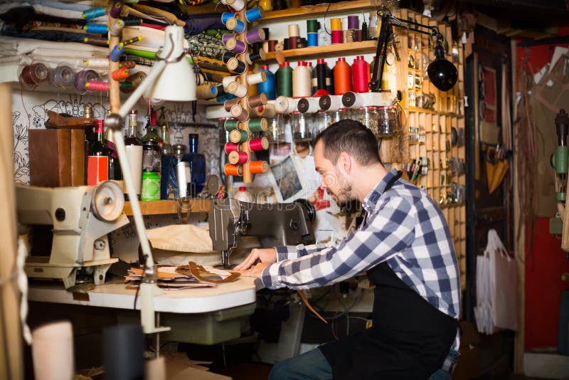 Young Man Worker Qualitatively Stitching Belt Stock Photo - Image of ...