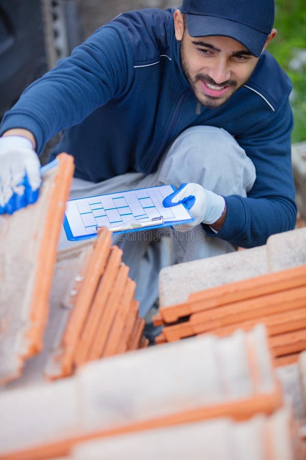 Young Man Working As Bricklayer Stock Image - Image of mortar ...