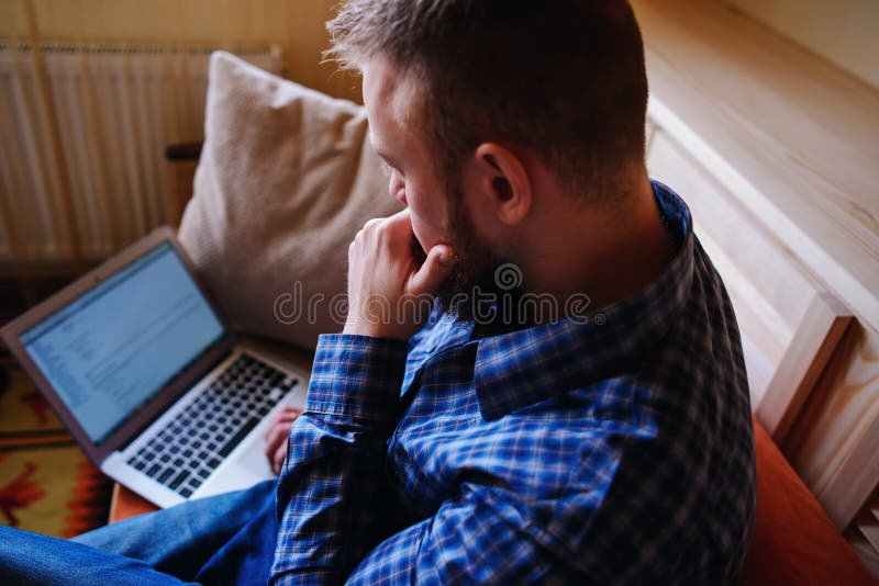 Young Man Working with Computer on the Beach. Handsome Man Working with ...