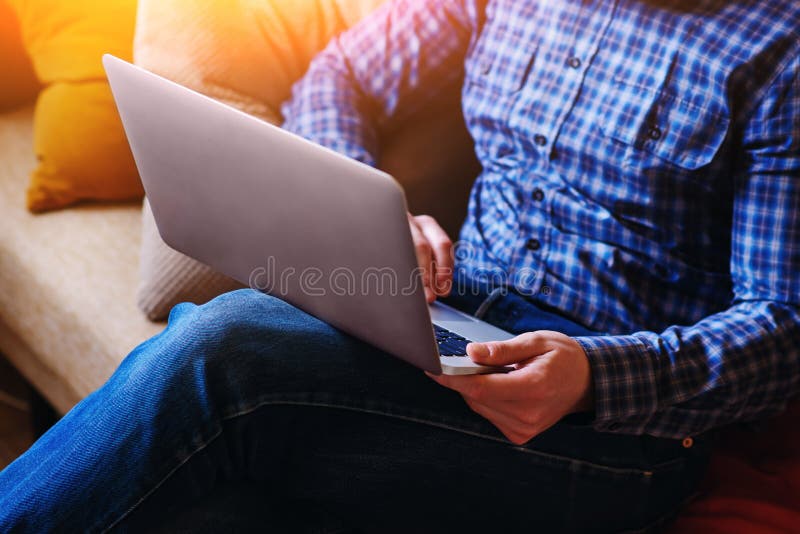 Young Man Working with Computer on the Beach. Handsome Man Working with ...