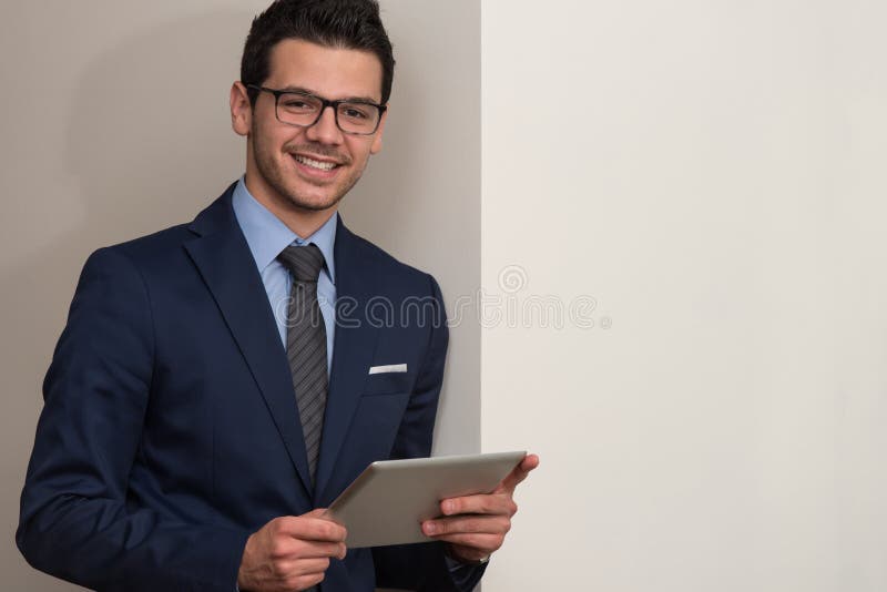Young Man Working on Computer in Office Stock Photo - Image of ...