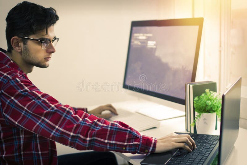 Young Man Working on the Desk Stock Photo - Image of internet, browsing ...
