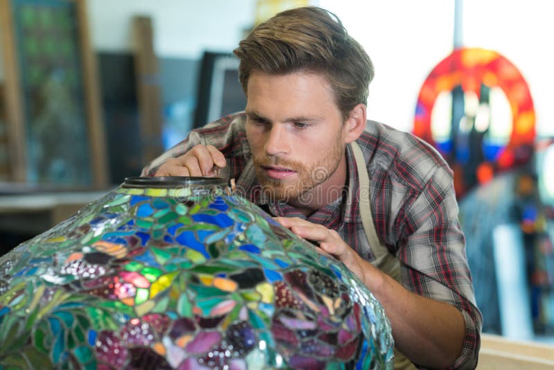 Young Man Working on Glass Creation Stock Image - Image of male ...