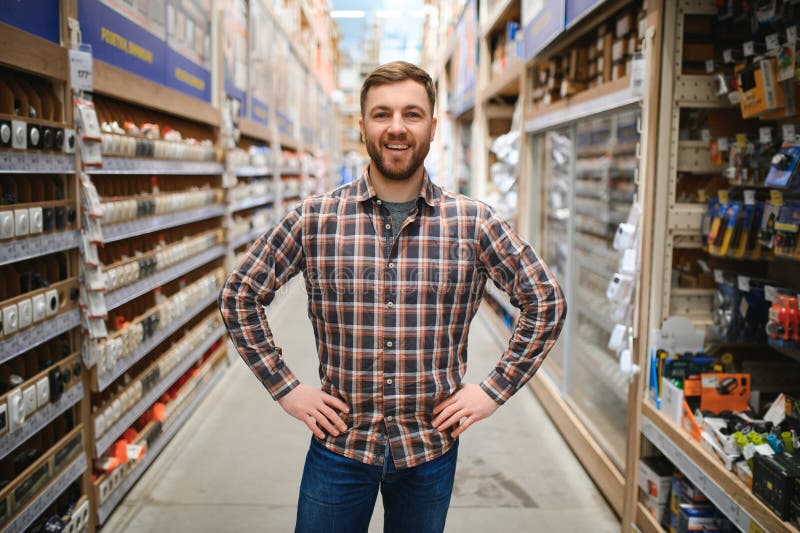 Young Man Working in Hardware Store Stock Image - Image of portrait ...