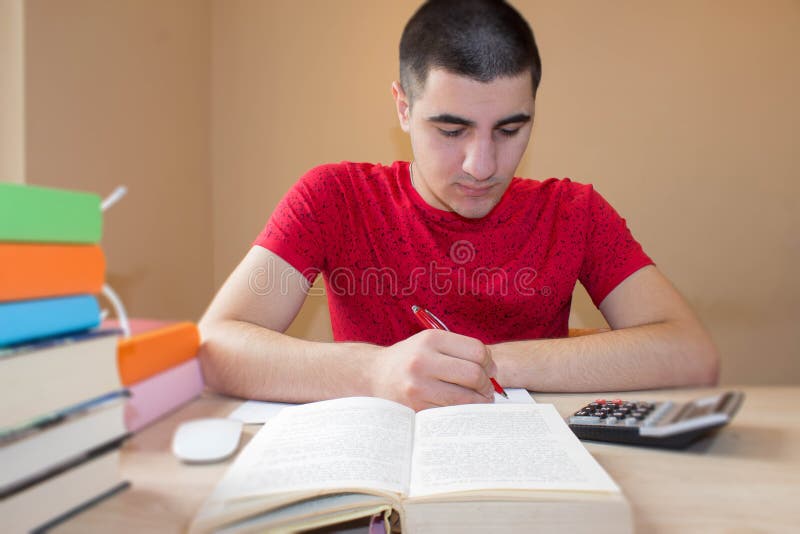 Young Man Working on His Homework. Thoughts, Education, Creativity ...