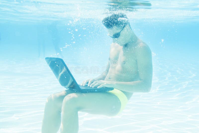 Young Man Working with His Laptop Underwater Stock Photo - Image of ...
