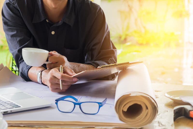 Young Man Working on His Plane Project at Site Construction Work Stock ...