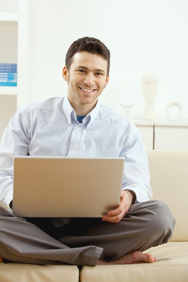 Young man working at home stock photo. Image of caucasian - 11861594