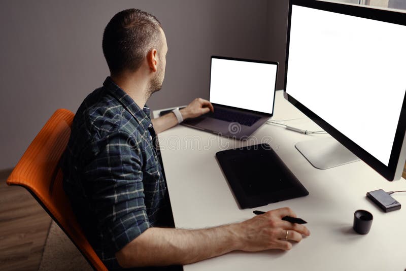 Young Man Working with Interactive Pen Display and Computer Stock Photo ...