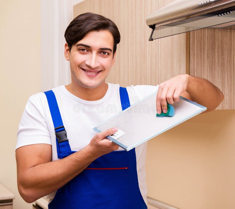 Young Man Working with Kitchen Equipment Stock Image - Image of ...