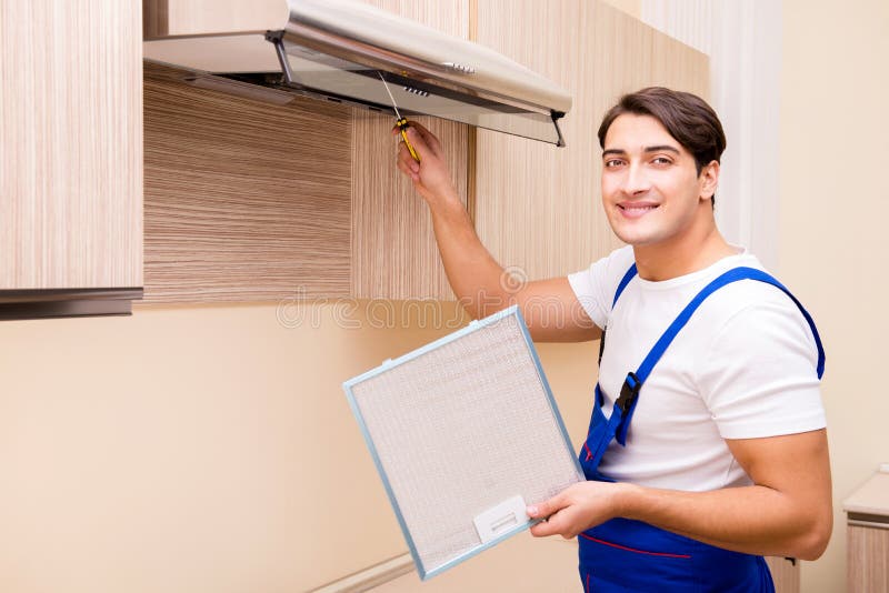 The Young Man Working with Kitchen Equipment Stock Photo - Image of ...