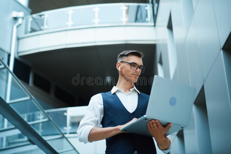 Young Man is Working on a Laptop. Stock Image - Image of businessman ...