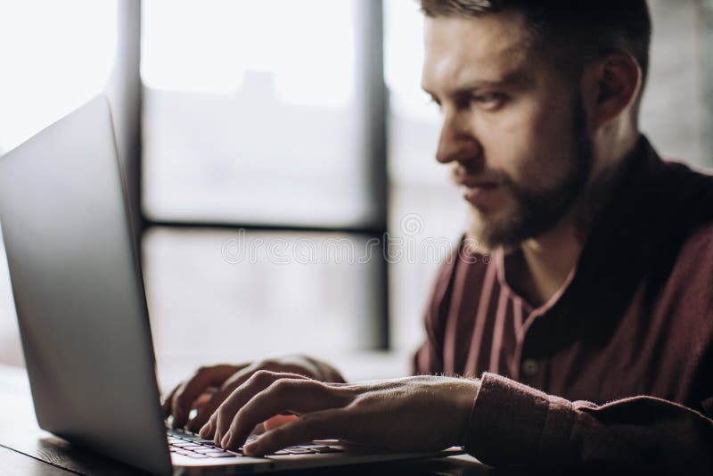 Young Man Working on Laptop Computer at Home, Freelancing Concept Stock ...