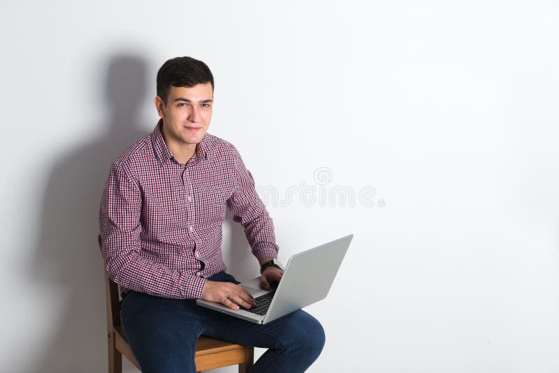 A Young Man Working on a Laptop Stock Image - Image of online, alone ...