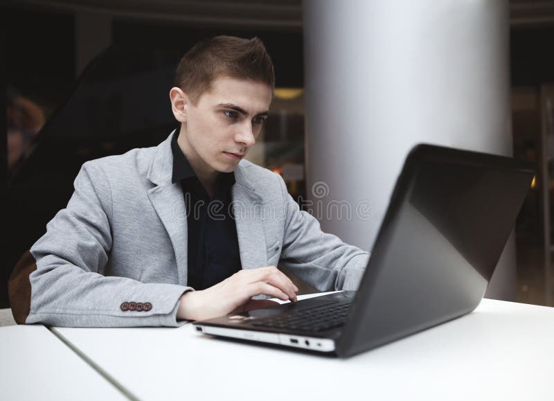 Young Man Working With Laptop Stock Photo - Image of young, manager ...