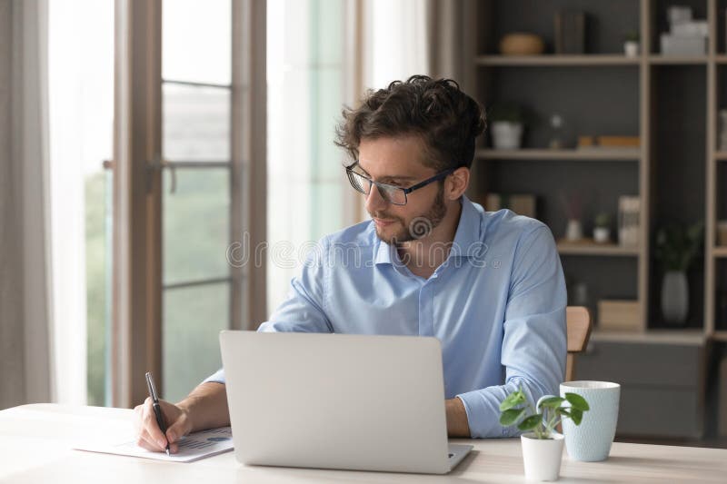 Young Man Working Notebook Taking Notes Paper Documents Stock Photos ...