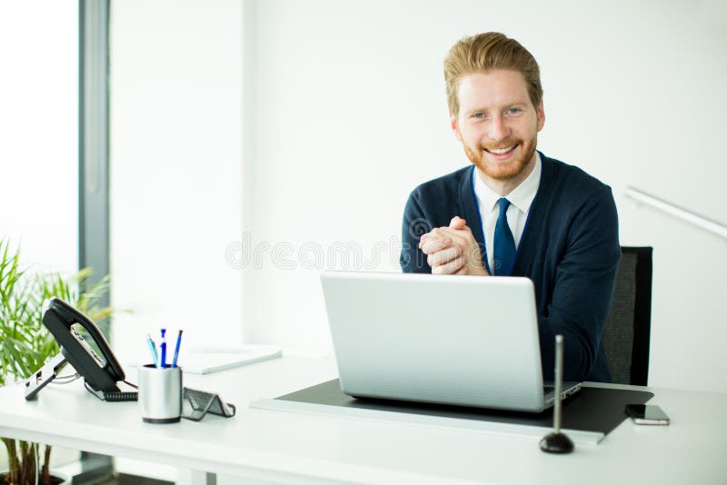 Young Man Working in Office Stock Photo - Image of business, employee ...