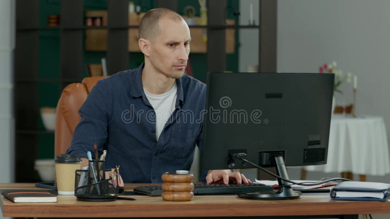 Young Man Working in Office on Desktop Computer. Male Manager Dressed ...